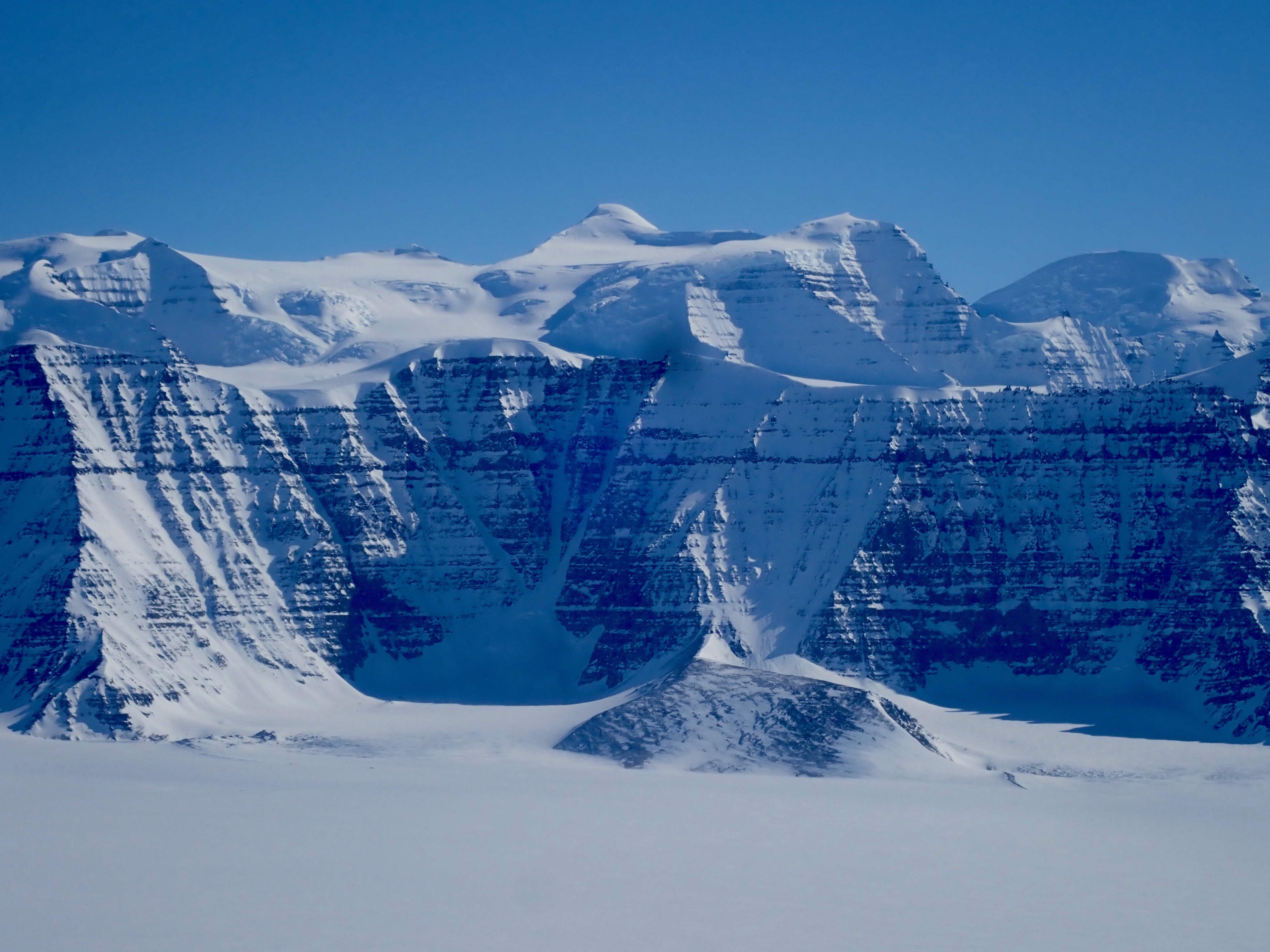 Mt. Gunnbjørn, the tallest mountain in Greenland, from the center ...